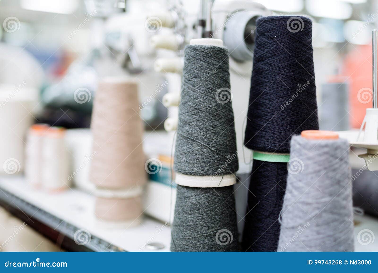Wool and Thread Spools on Desk Stock Photo - Image of fabric, design ...