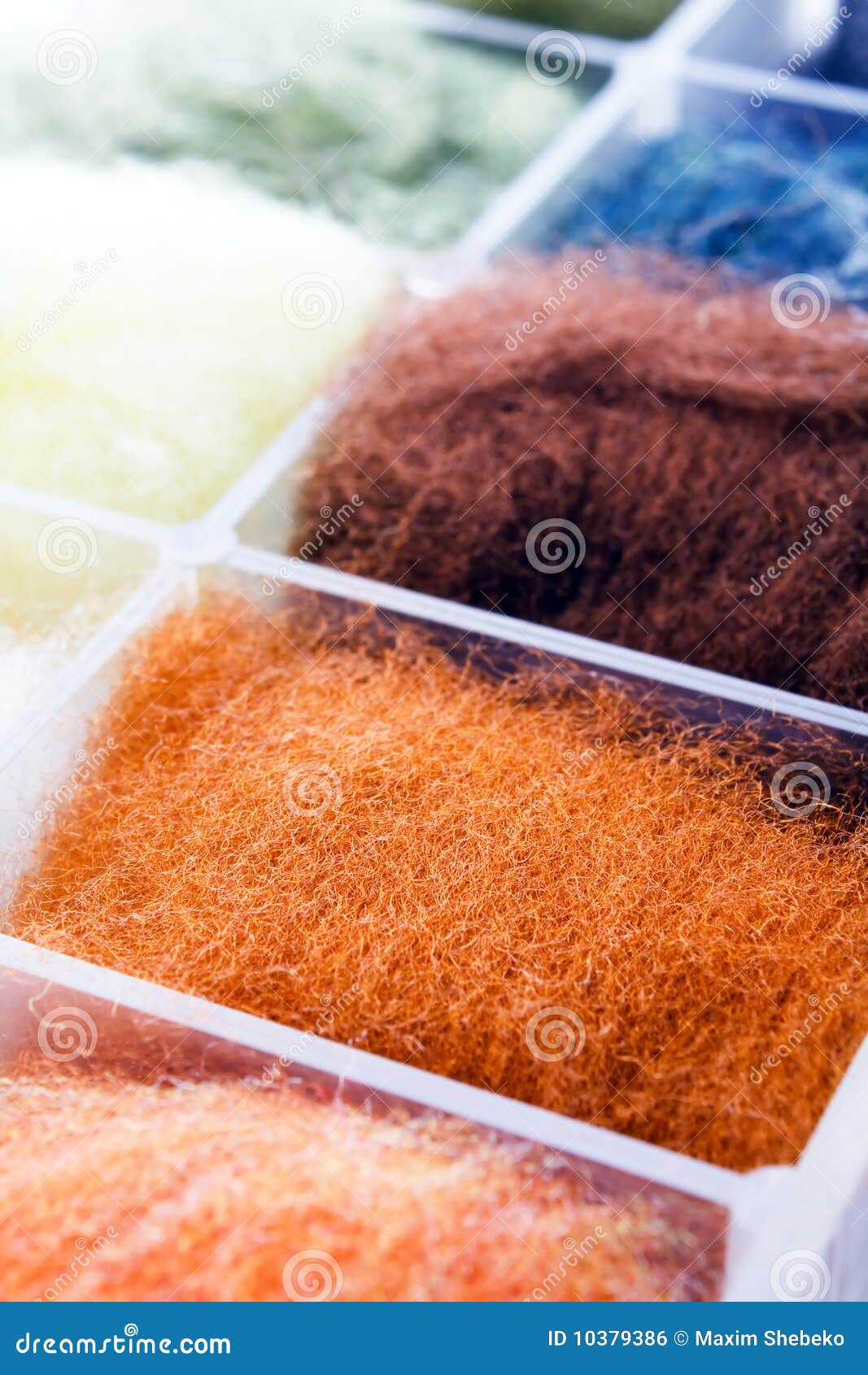 Wool tufts before felting stock photo. Image of orange - 10379386
