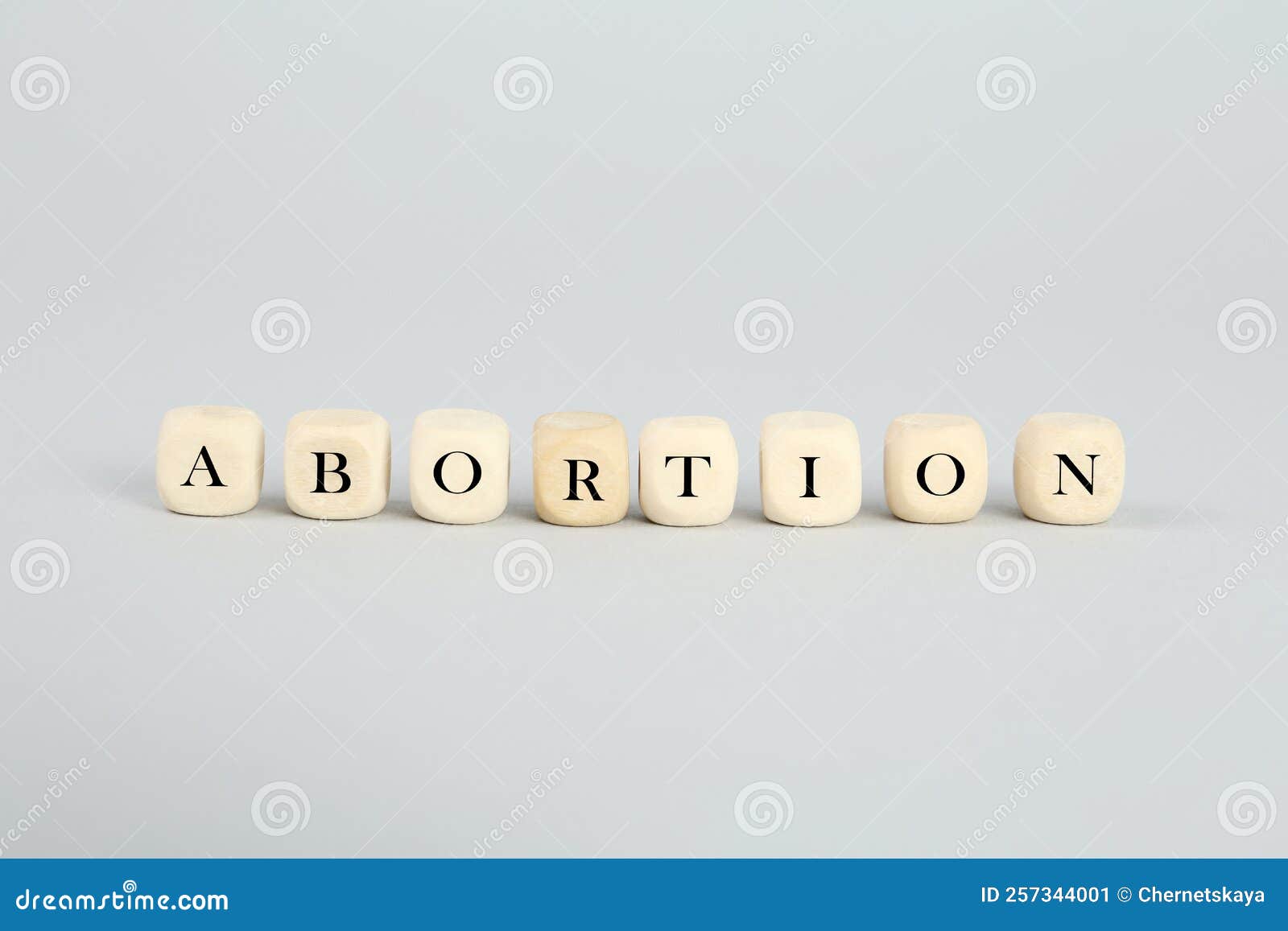 Word Abortion Made of Wooden Cubes on Light Grey Background Stock Image ...