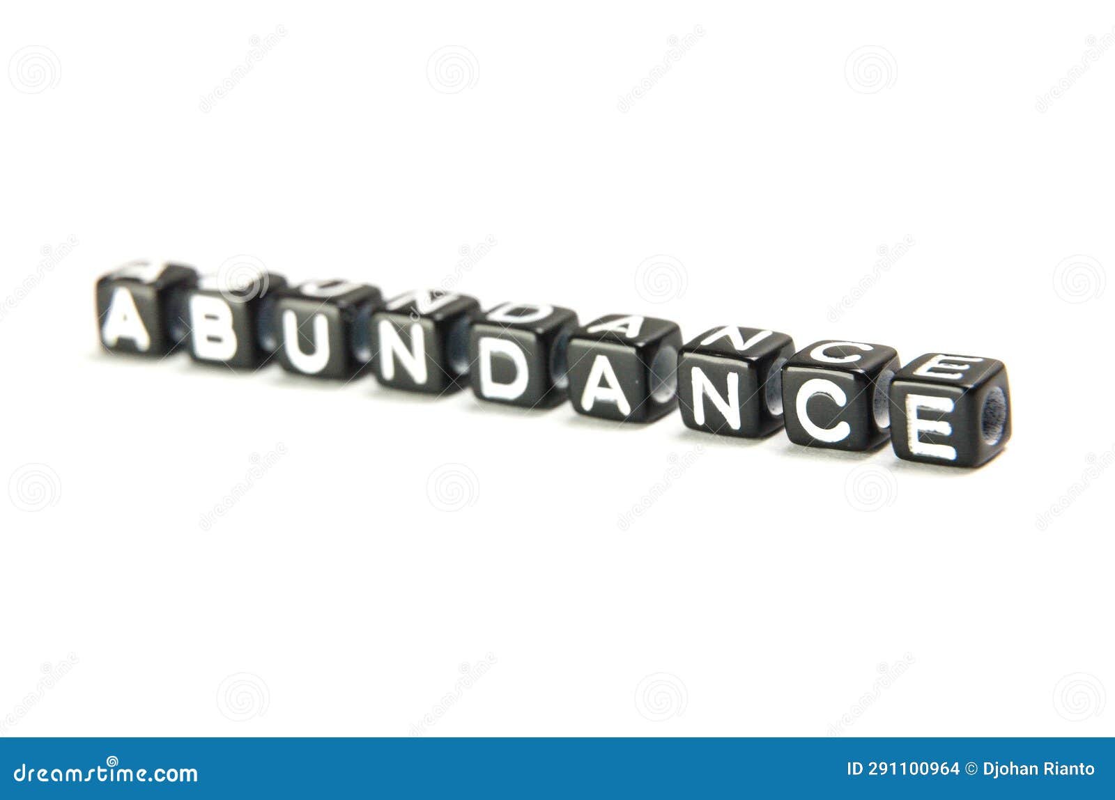 The Word Abundance on the Black Dice Side View Isolated on White ...