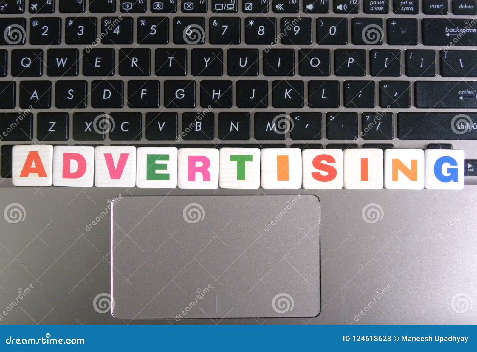 Word Advertising on Keyboard Background Stock Photo - Image of backdrop ...