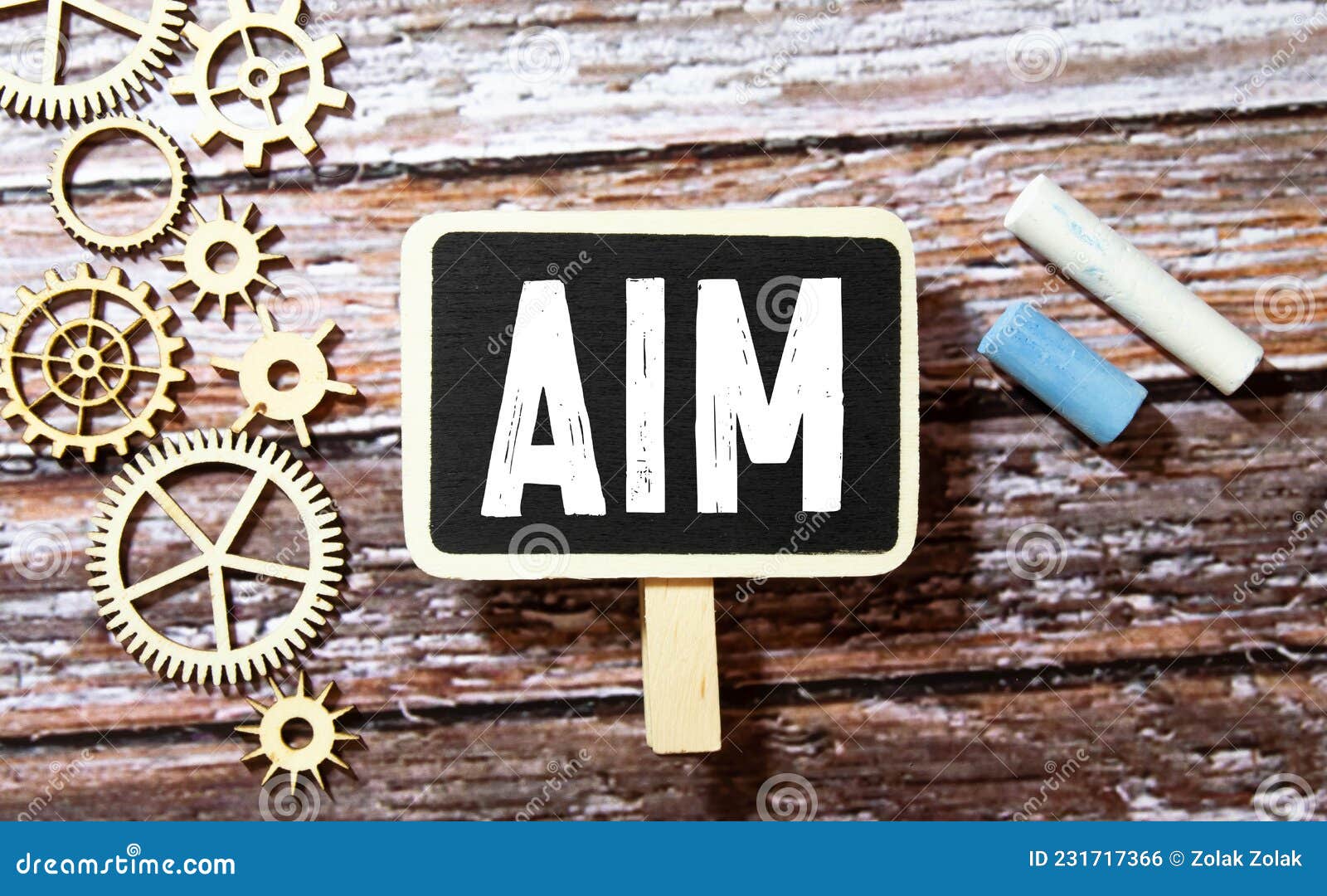 The Word Aim on a Strip of White Paper. a Red Dart Will Be Stuck in the ...