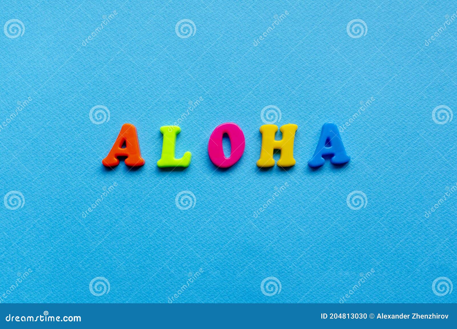 Word Aloha on Blue Paper Background. Stock Photo - Image of creativity ...