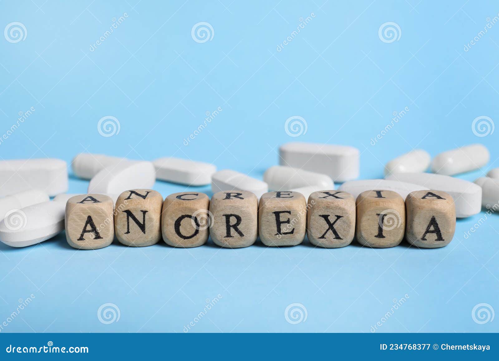 Word Anorexia Made of Wooden Cubes with Letters Near Pills on Light ... Word Anorexia Made of Wooden Cubes with Letters Near Pills on Light ...