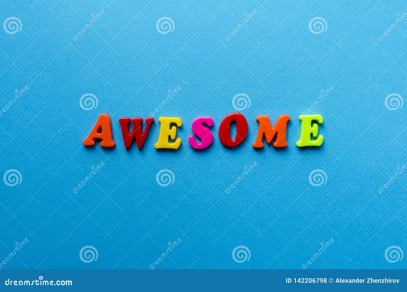 Word Awesome from Plastic Magnetic Letters on Blue Background Stock ...