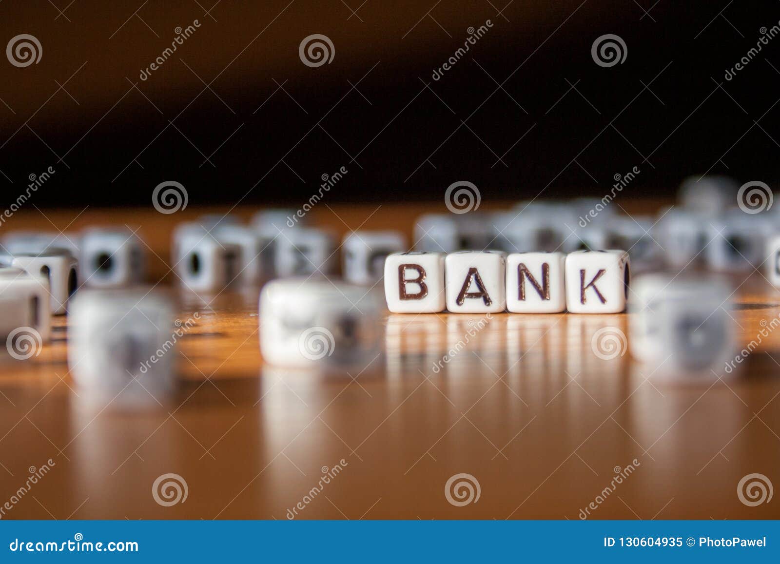 The Word BANK Made of White Plastic Blocks on the Table. Stock Image ...