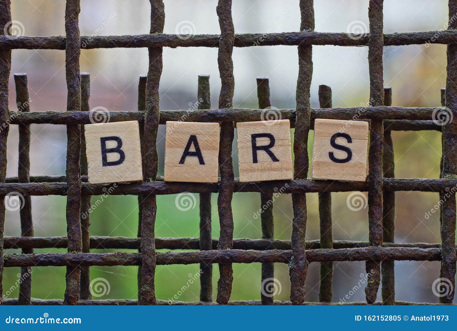 Word Bars Made of Wooden Letters on an Iron Grate Stock Image - Image ...