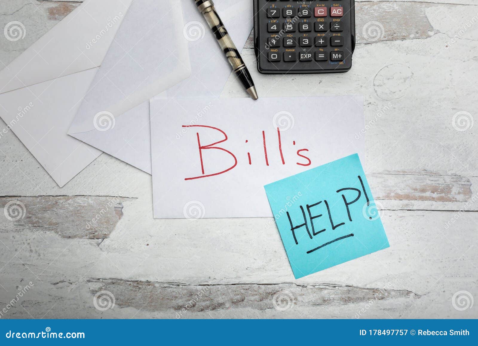 The Word Bills Hand Written on White Envelope with Blue Posted Note ...