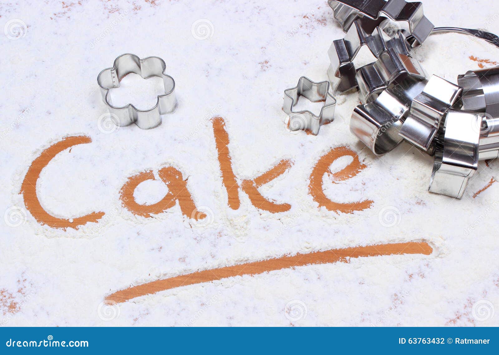 Word Cake Written in Flour and Cookie Cutters Stock Photo - Image of ...