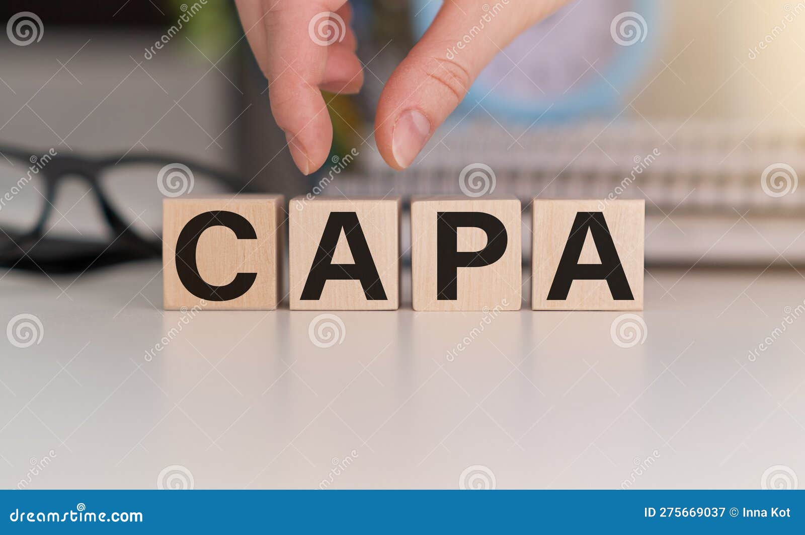 Word Capa. Wooden Small Cubes with Letters Isolated on Table with Copy ...
