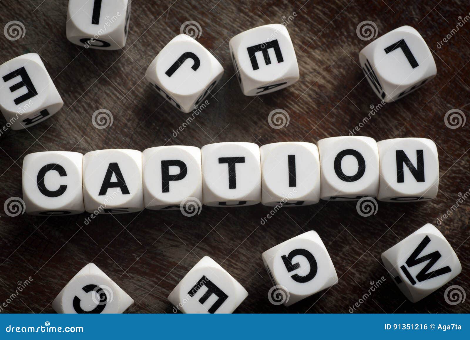 Word caption on toy cubes stock photo. Image of caption - 91351216