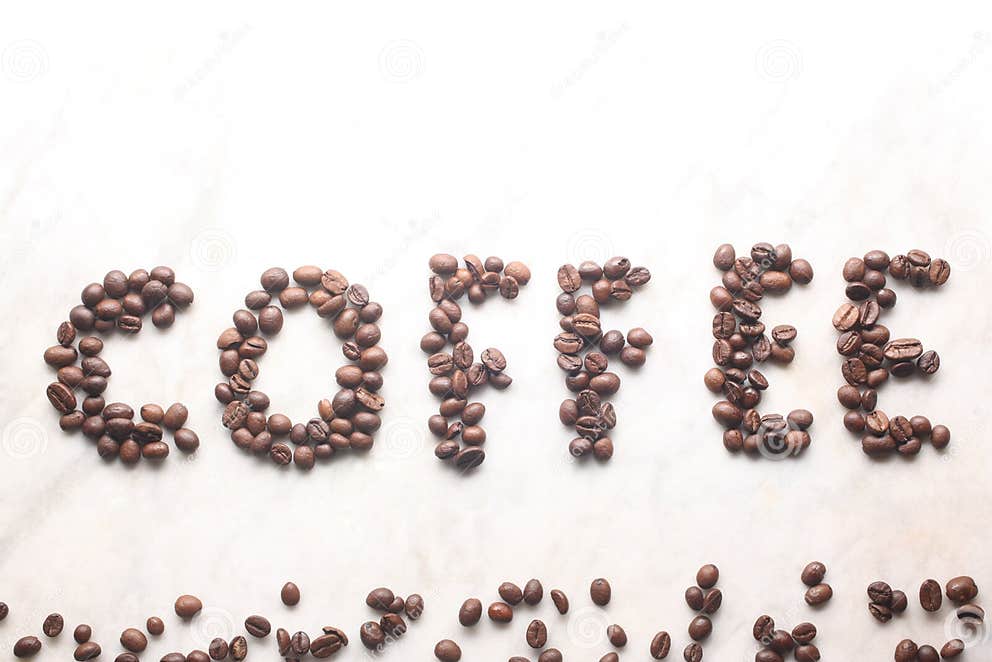 Word Coffe Written with Coffe Beans on a Marble Table with Copy Space ...