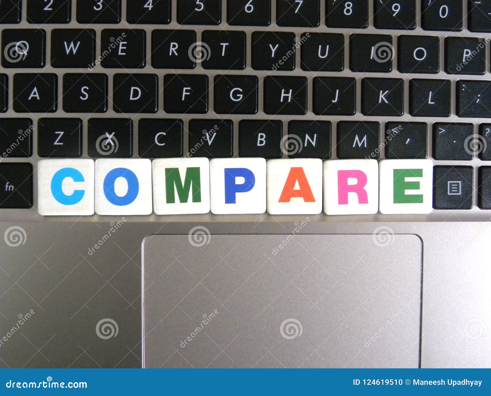 Word Compare on Keyboard Background Stock Photo - Image of backdrop ...