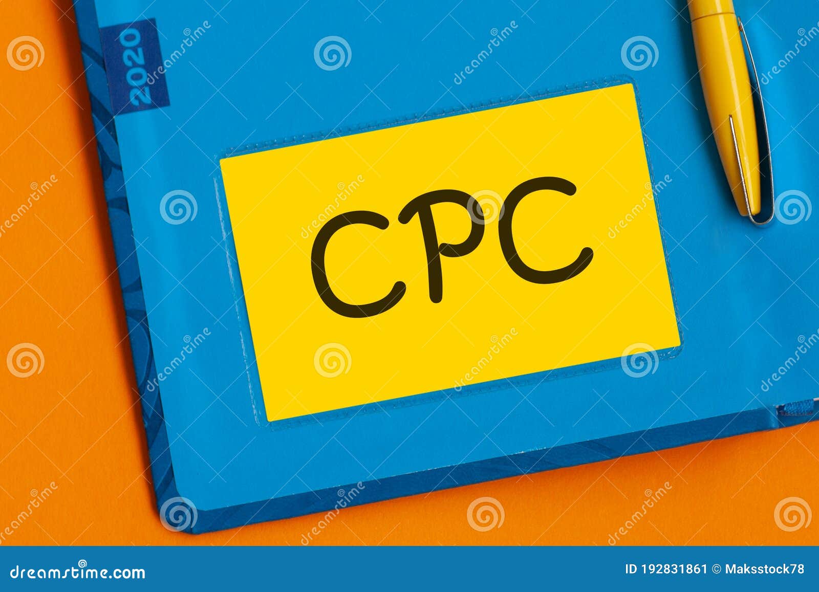 The Word CPC is Written in Black Marker on the Yellow Paper for Notes ...