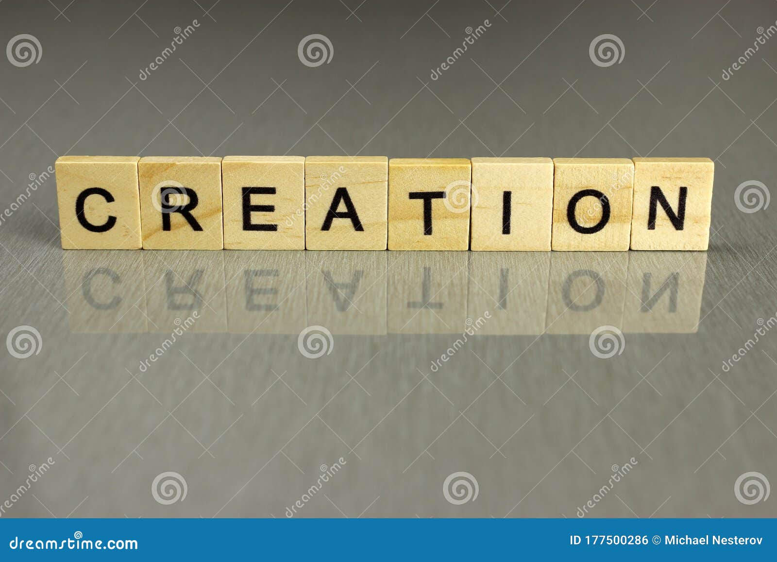 Word Creation is Made of Square Wooden Letters on a Gray Background ...