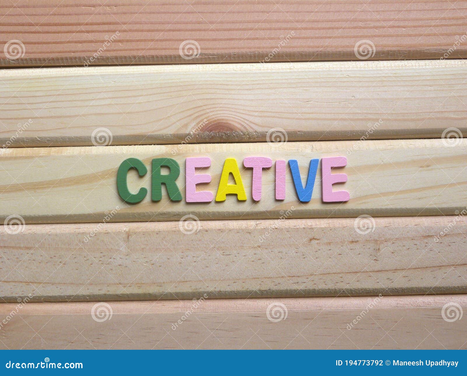 Word Creative on wood stock photo. Image of backdrop - 194773792