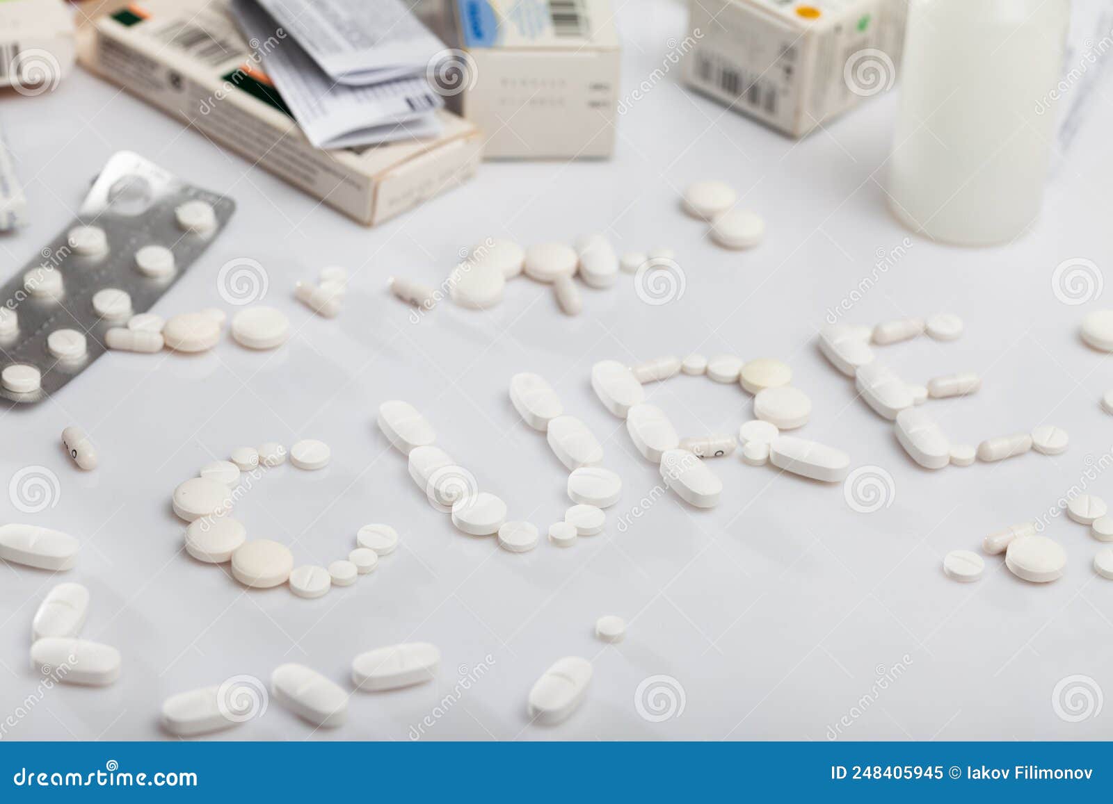 Word CURE Lined with Tablets Stock Image - Image of prescription ...