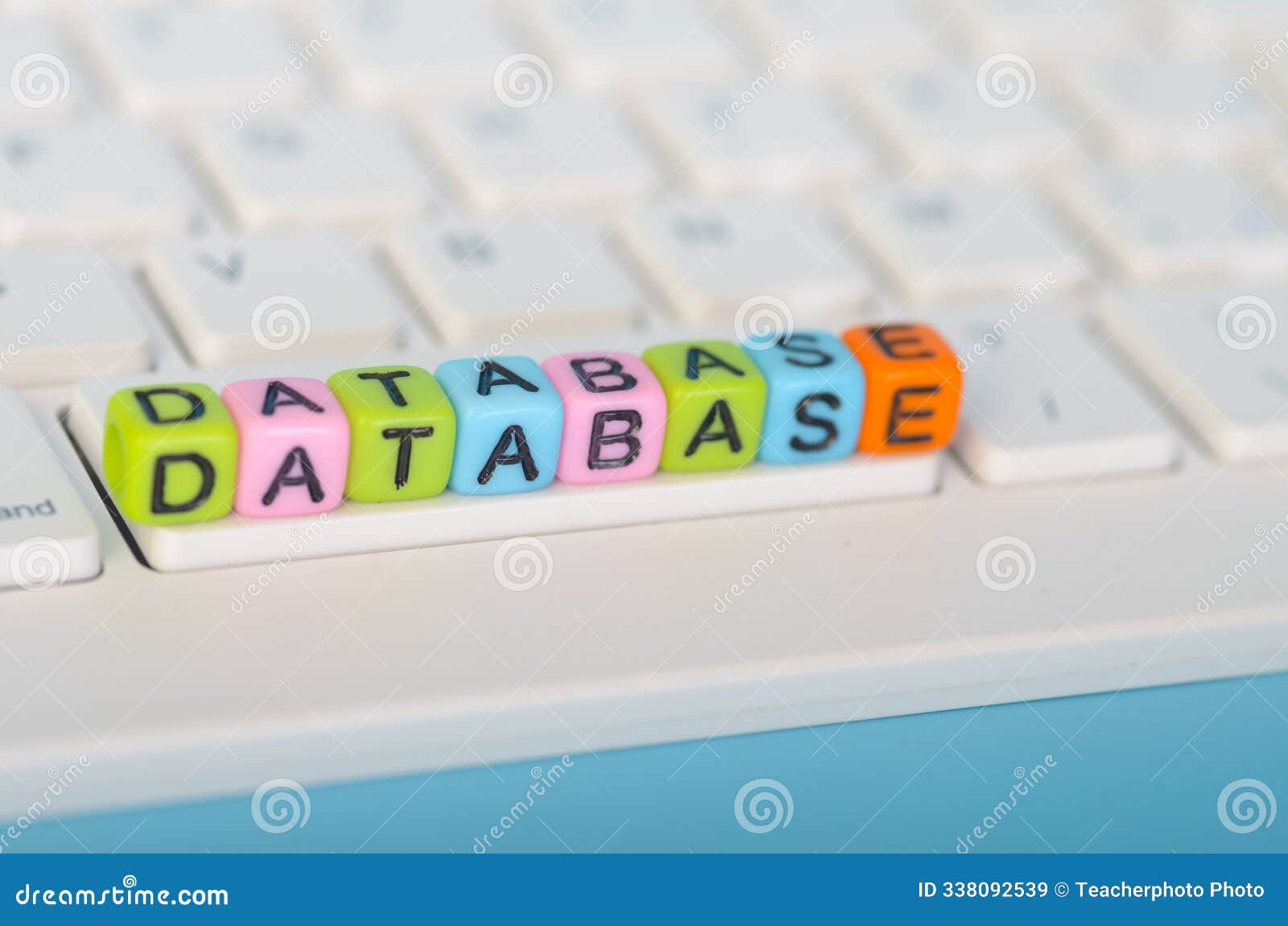 The Word "DATABASE" Colorful Letter Blocks on a Computer Keyboard ...