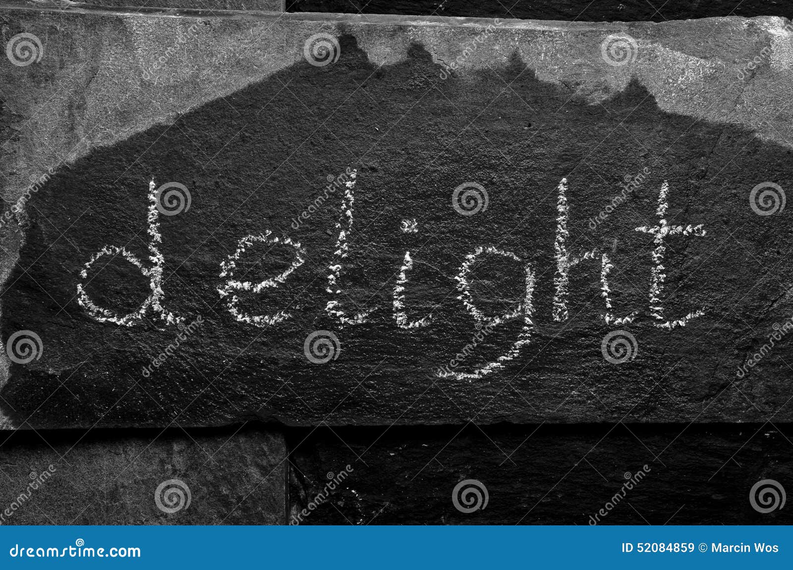 The Word DELIGHT Written with Chalk on Black Stone. Stock Image - Image ...