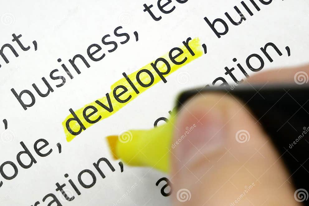 Word Developer Undelnines among Other Words Printed on White Paper ...