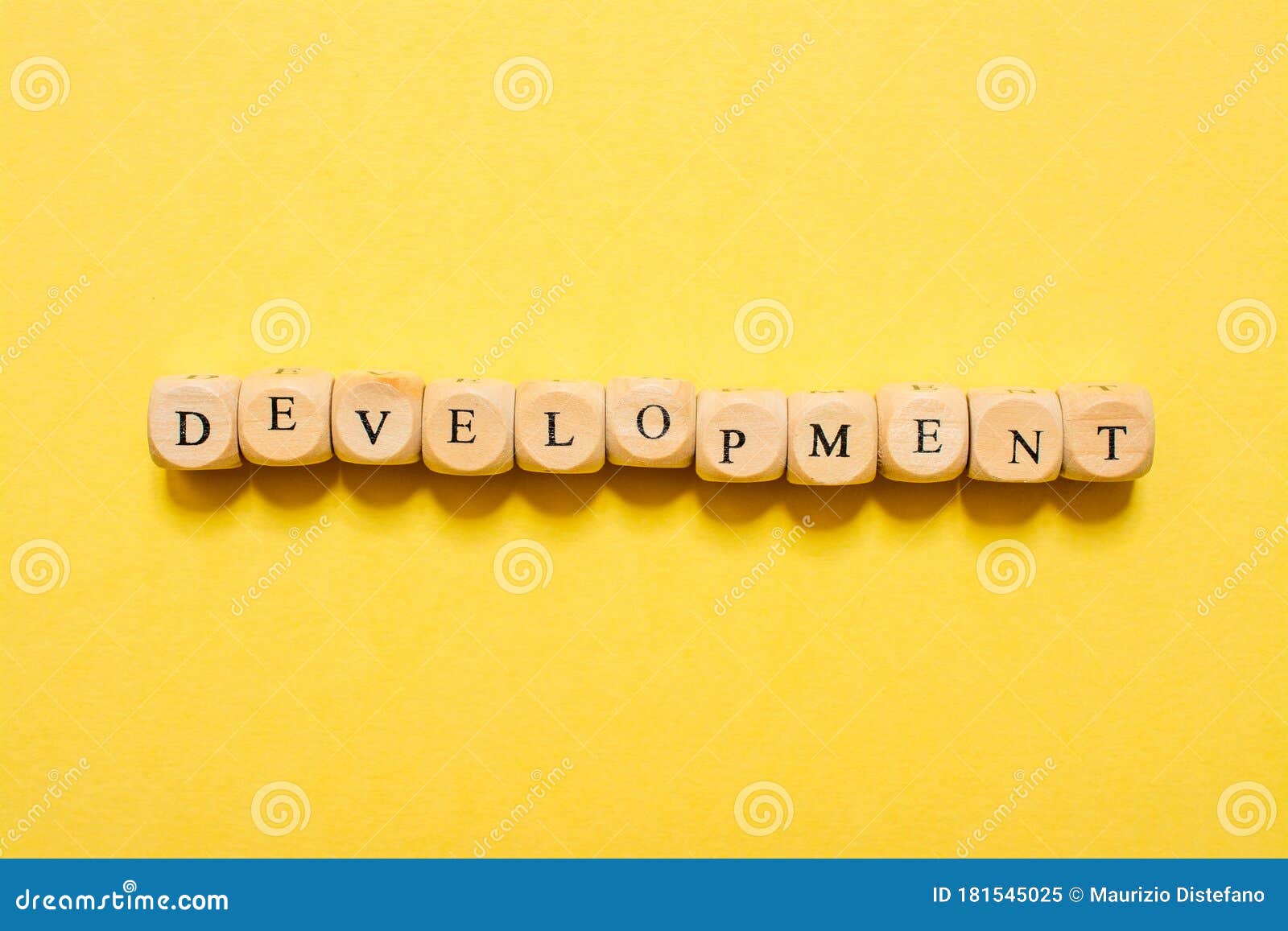 The Word Development, Text Made with Dice on Yellow Background Stock ...