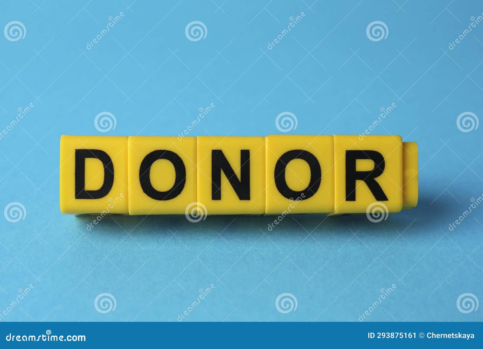 Word Donor Made of Cubes on Light Blue Background Stock Image - Image ...