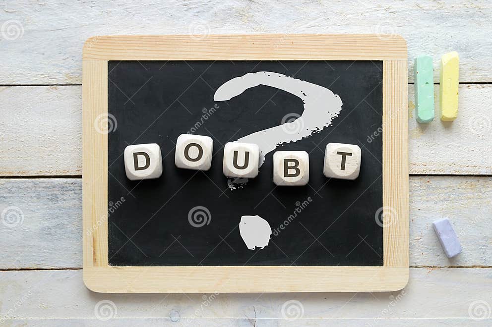 The Word DOUBT and the Question Mark Written on a Blackboard. Stock ...