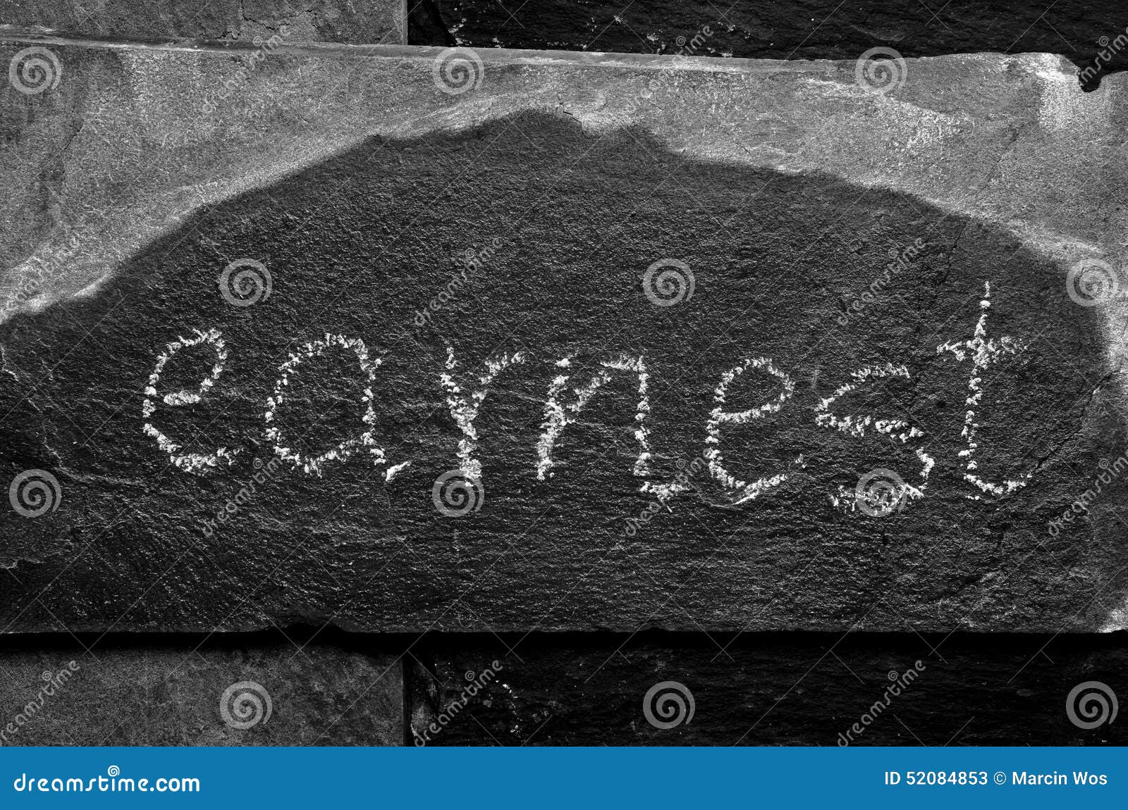 The Word EARNEST Written with Chalk on Black Stone Stock Image - Image ...
