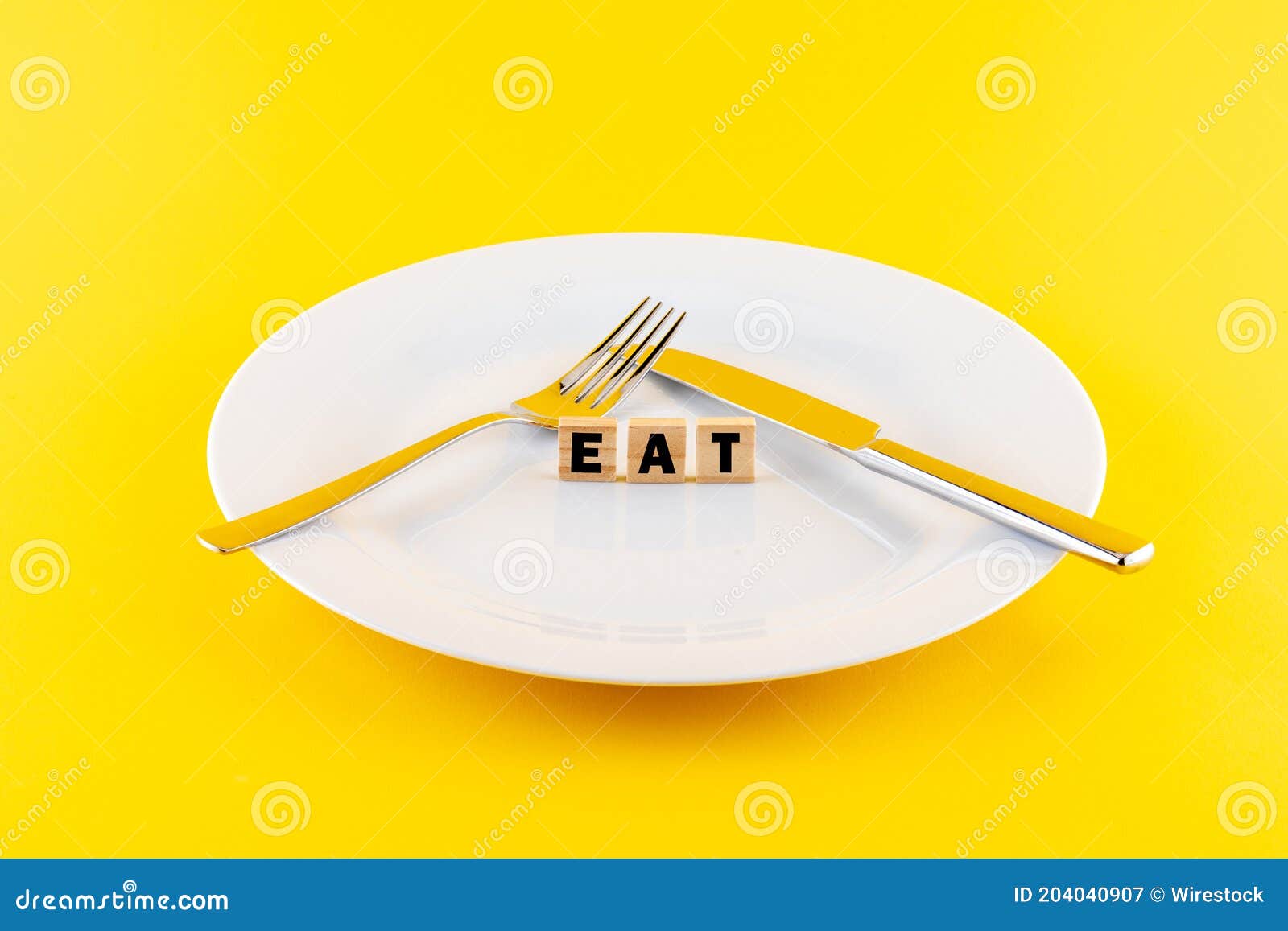 Word Eat on Wooden Blocks on a Plate Stock Image - Image of measure ...