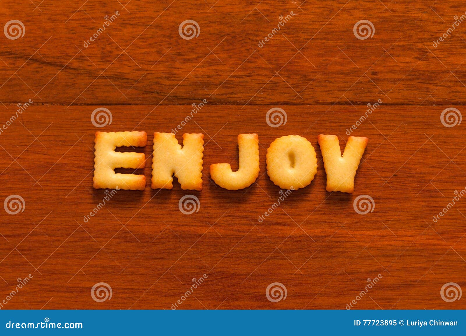 The Word Enjoy Written with Cracker Stock Image - Image of table ...