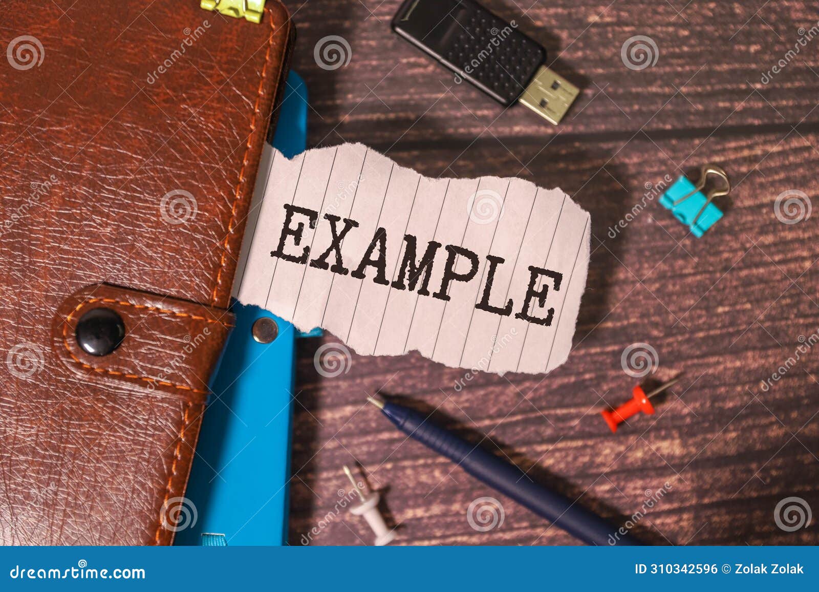The Word EXAMPLE is Written in the Notebook with Office Tools and Cup ...