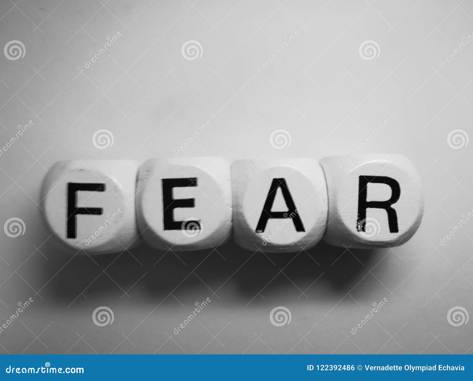 Word fear spelled on dice stock photo. Image of white - 122392486