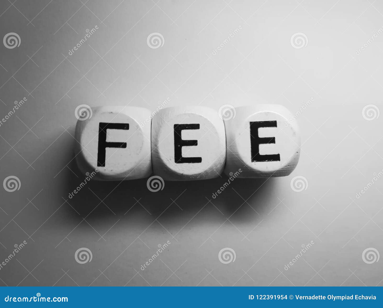 Word fee spelled on dice stock photo. Image of theme - 122391954