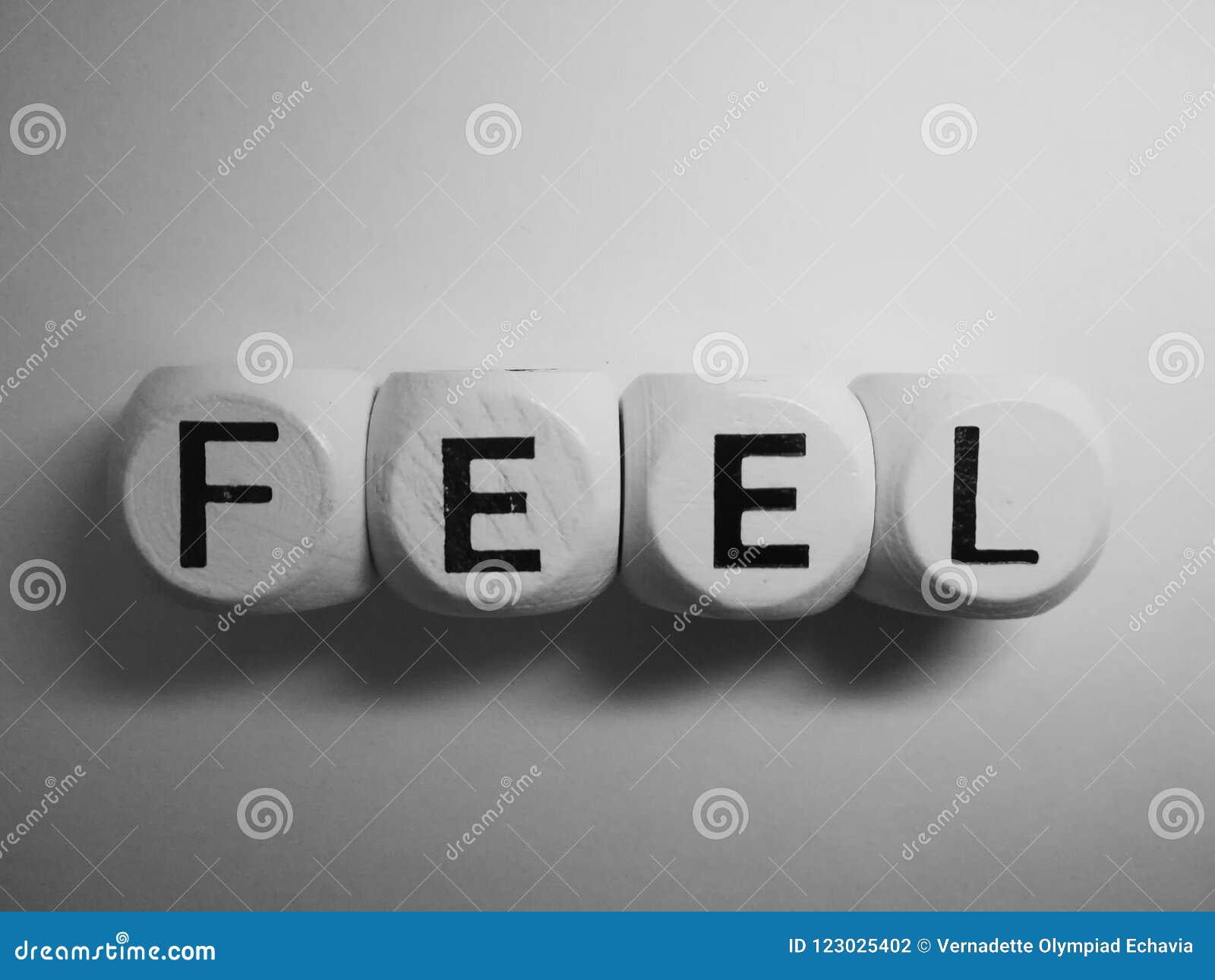Word feel spelled on dice stock photo. Image of letter - 123025402