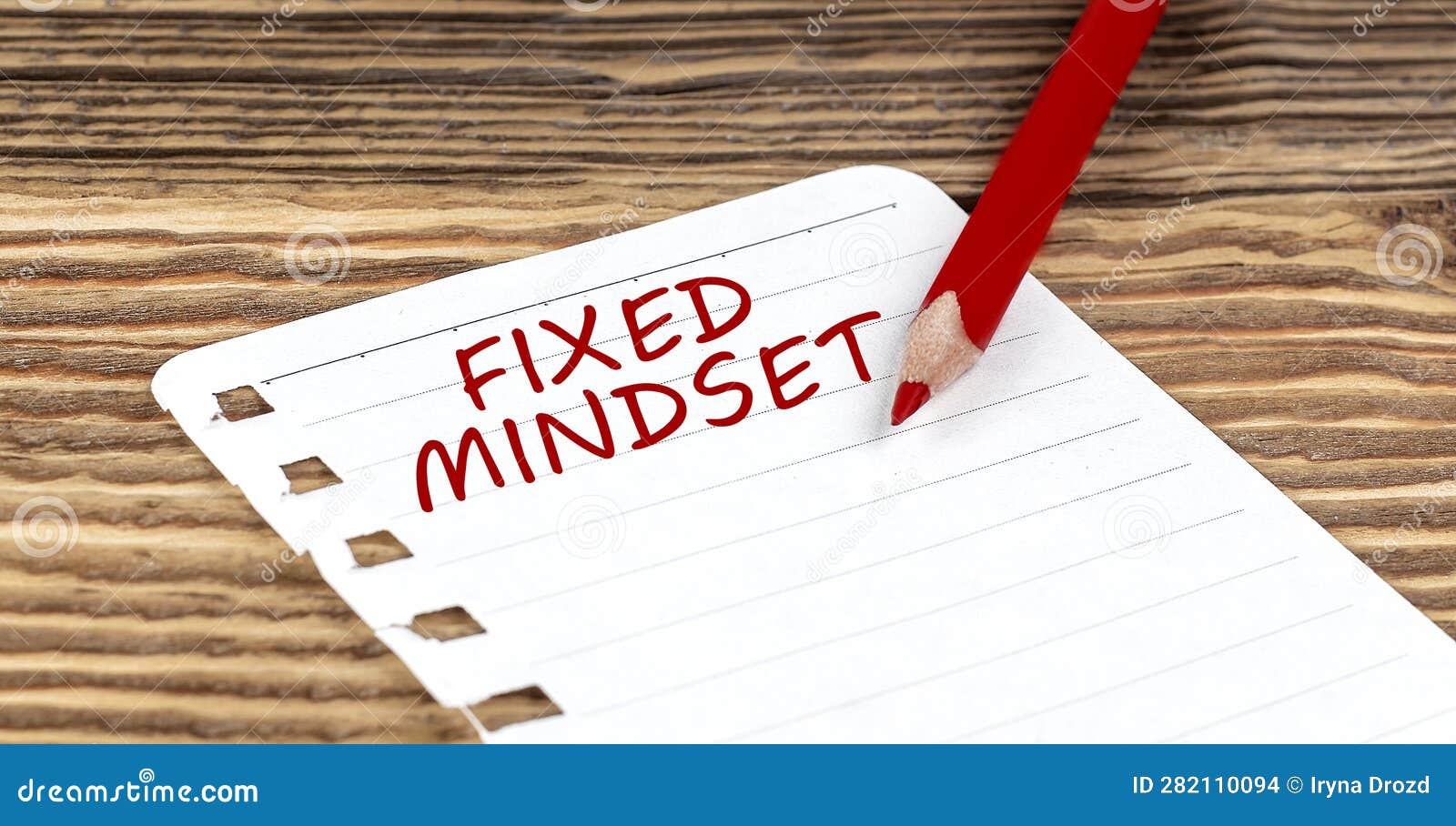 Word FIXED MINDSET on a Paper with Ped Pencil on Wooden Background ...