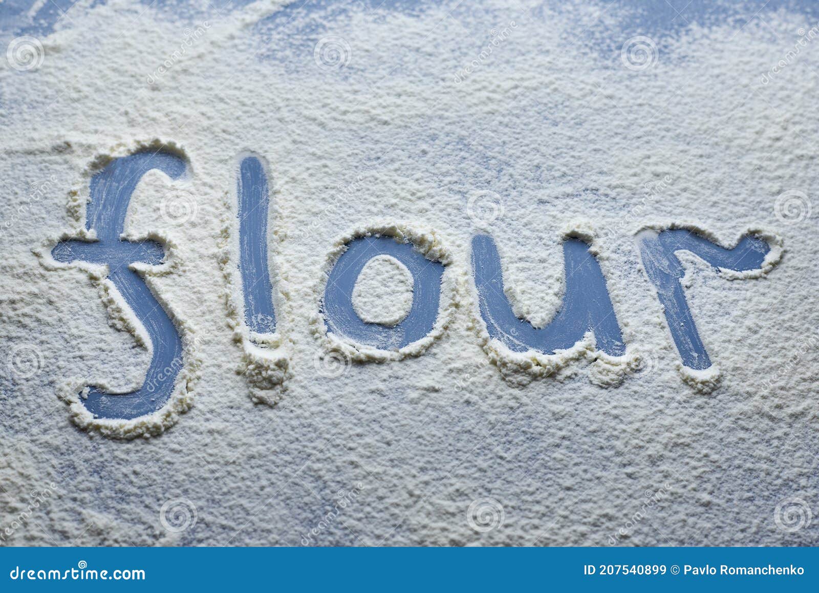 The Word Flour is Written on Scattered Flour on a Blue Background Stock ...