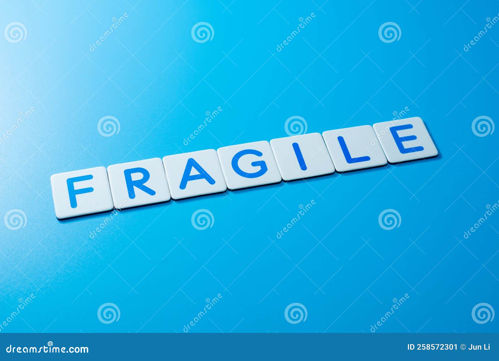 Word FRAGILE On Blue Background,FRAGILE Concept Royalty-Free Stock ...