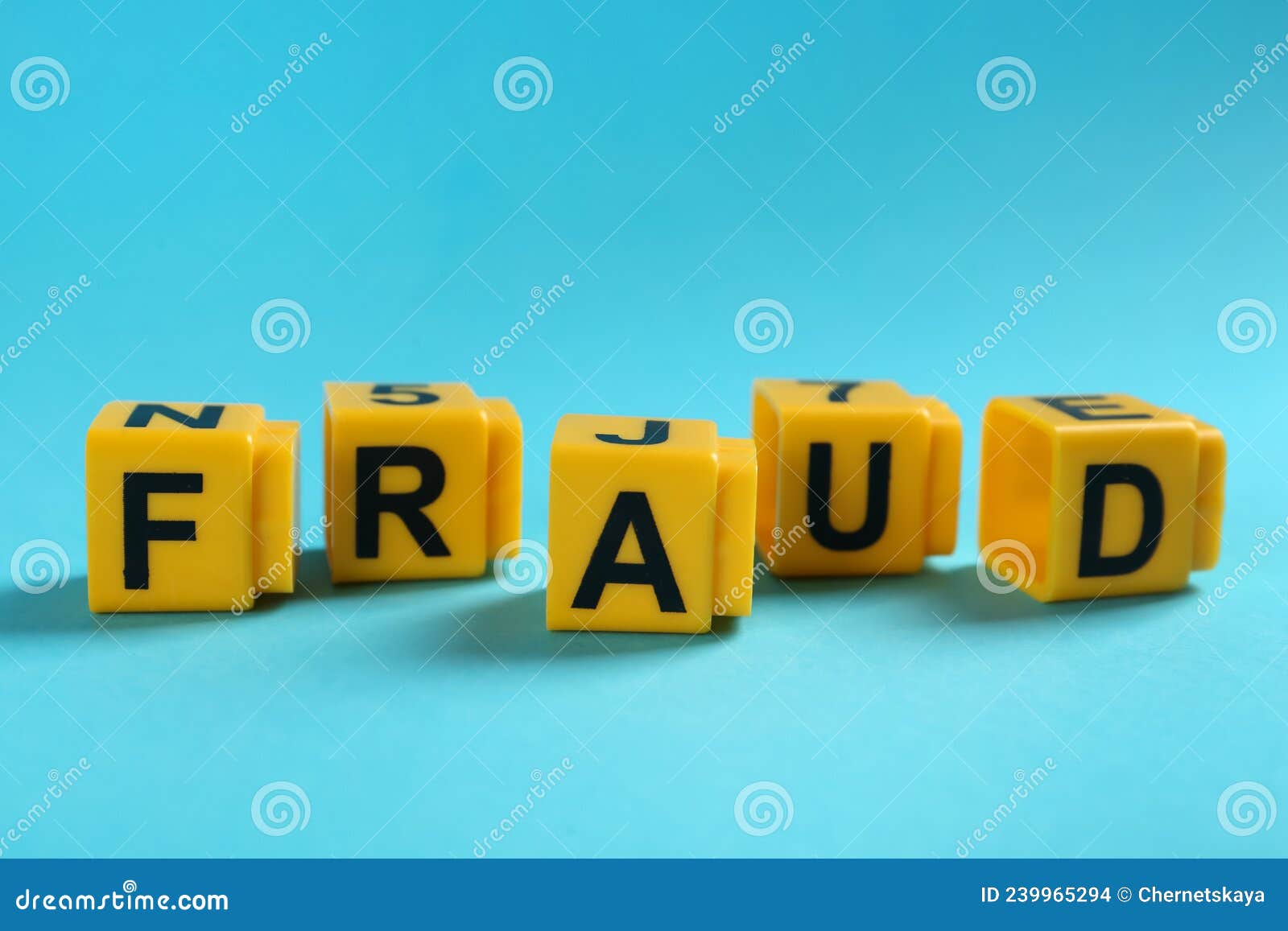 Word Fraud of Yellow Cubes with Letters on Light Blue Background Stock ...
