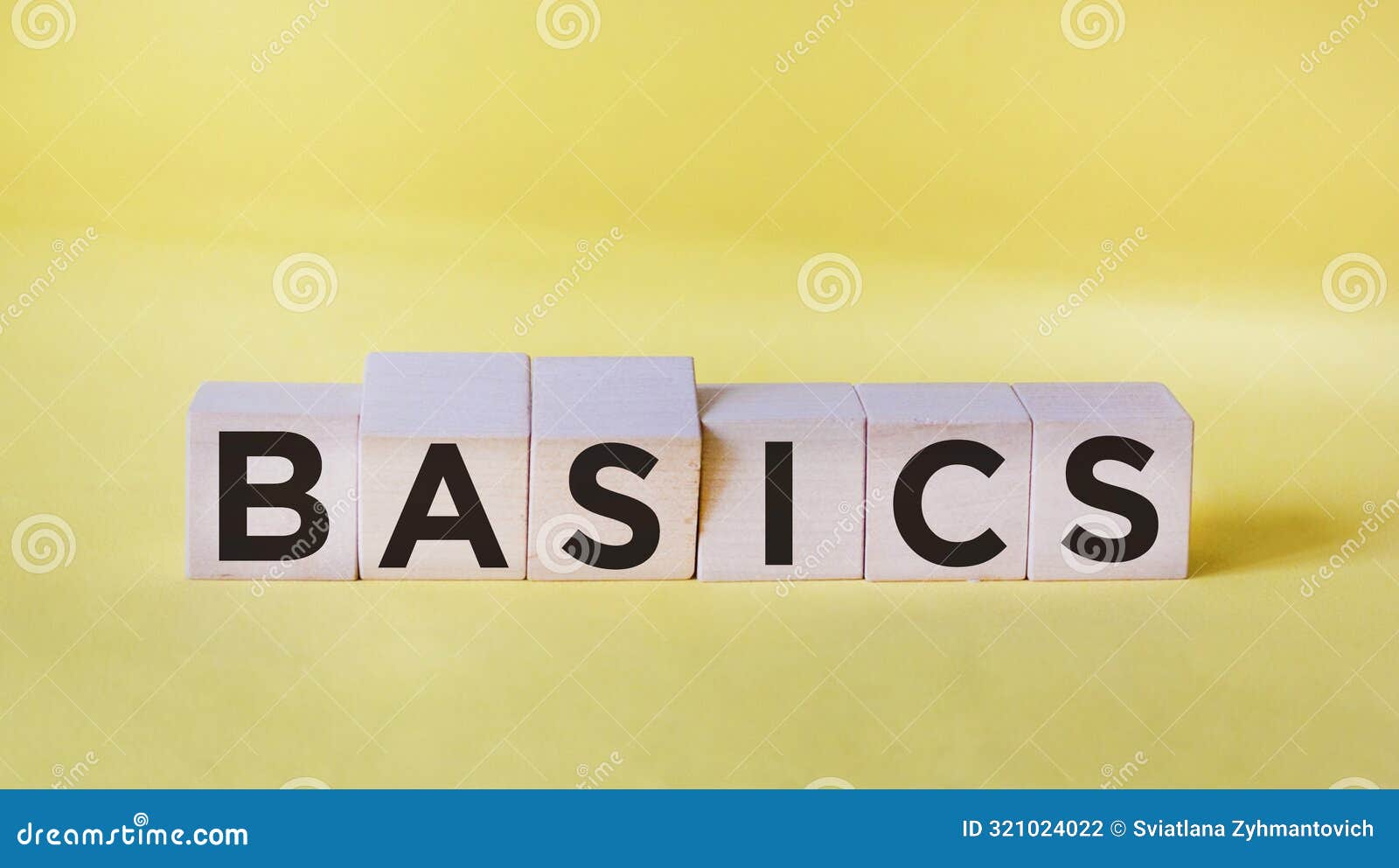 The Word FUNDAMENTALS Made from Building Blocks on a Yellow Background ...