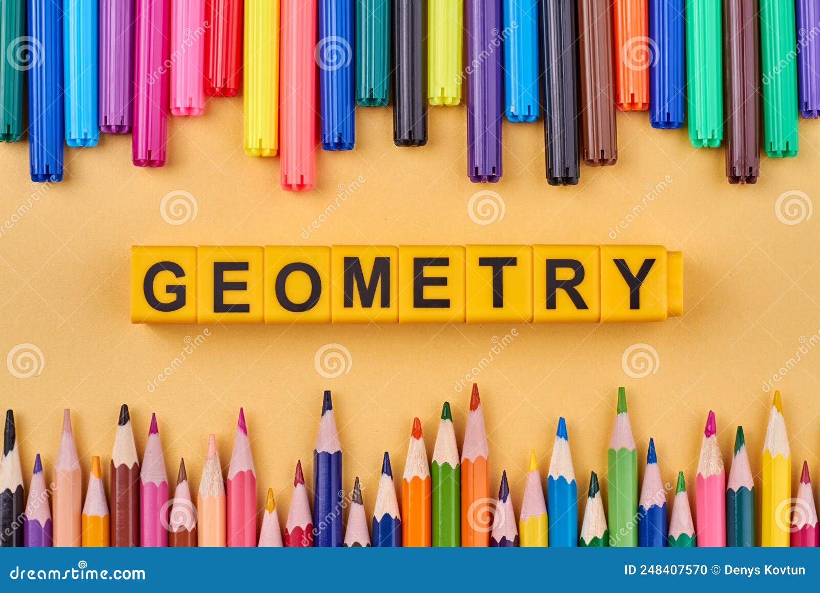 The Word GEOMETRY Written on Plastic Cubes in Frame from Colored School ...