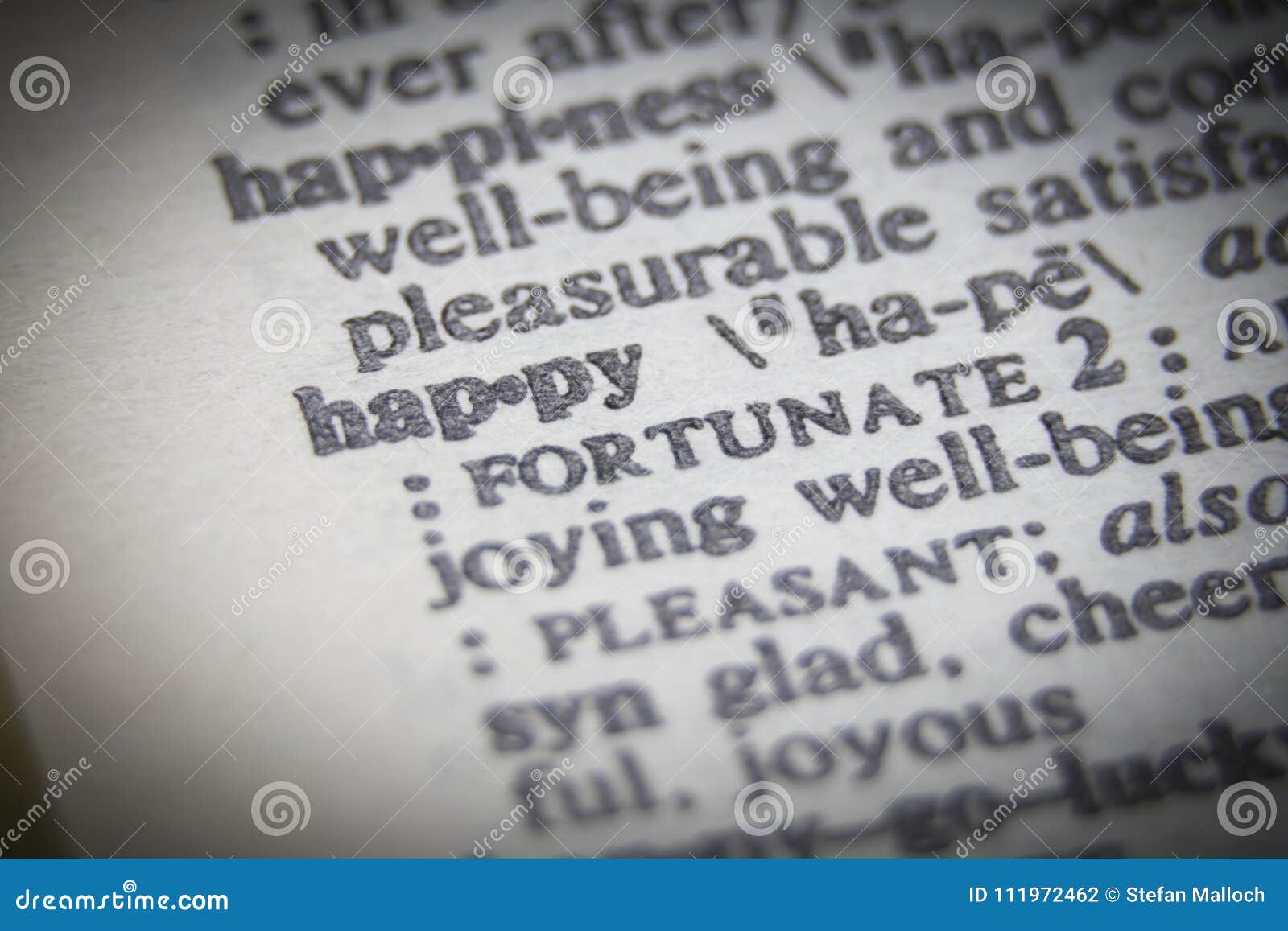 The Word Happy Close Up on Paper Stock Photo - Image of language ...