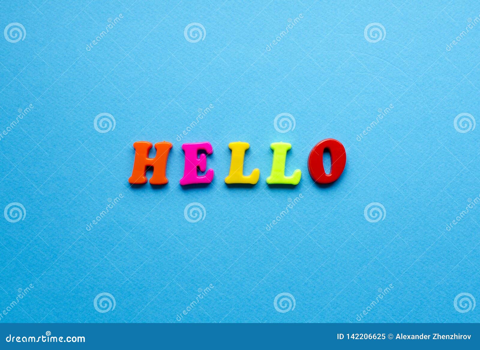 Word Hello from Plastic Magnetic Letters on Blue Background Stock Image ...