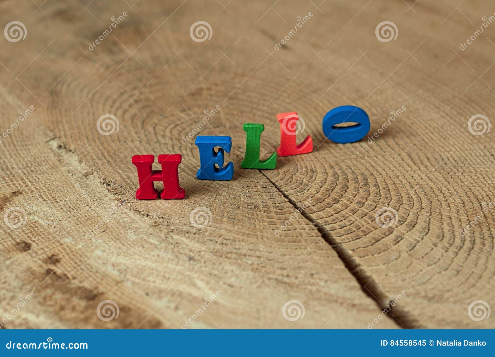 Word Hello from Small Wooden Letters on a Stump Stock Image - Image of ...