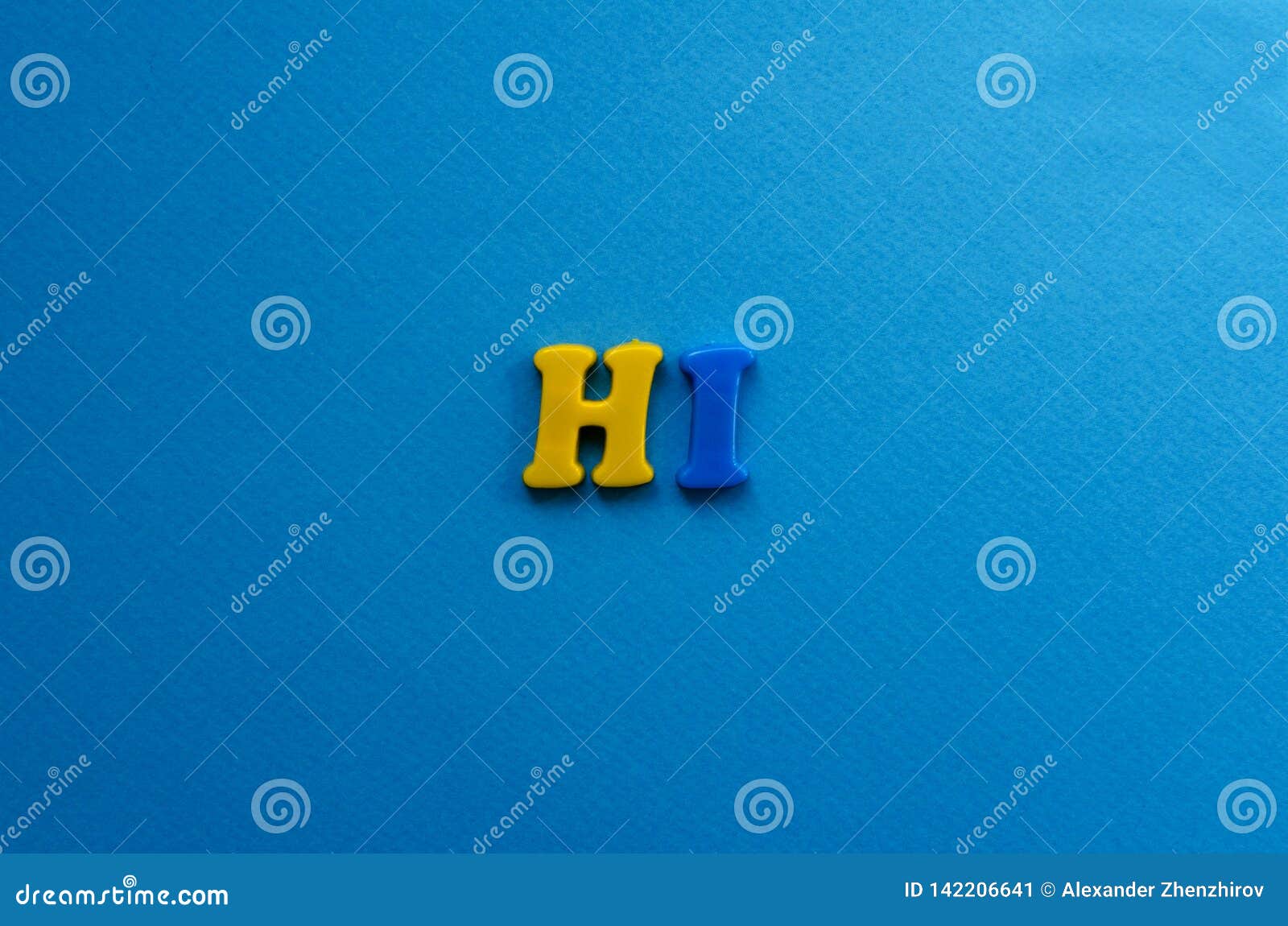 Word Hi from Plastic Magnetic Letters on Blue Background Stock Image ...