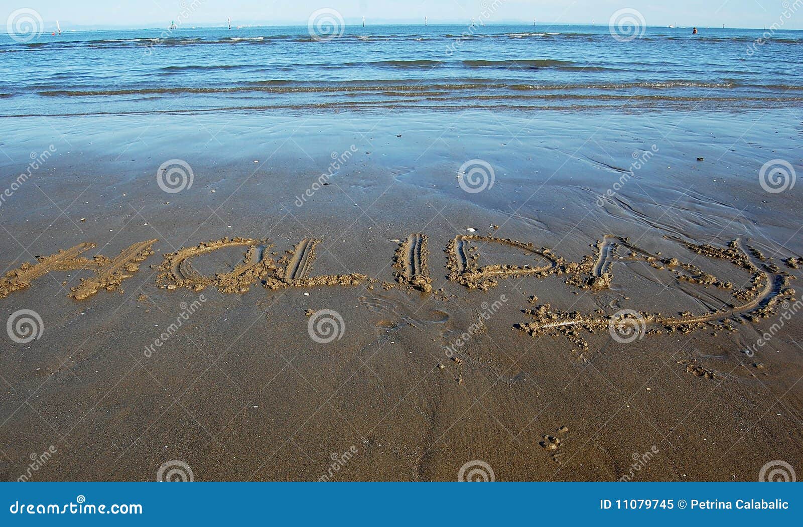 Word Holiday Written in the Sand Stock Image - Image of weekend ...