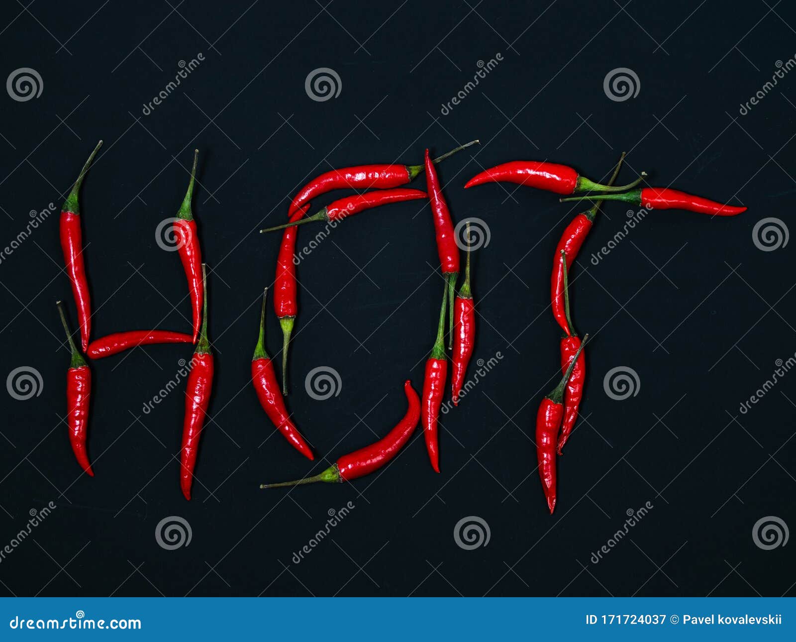 Word Hot Red Hot Chili Peppers On Black Dark Background On Black Table