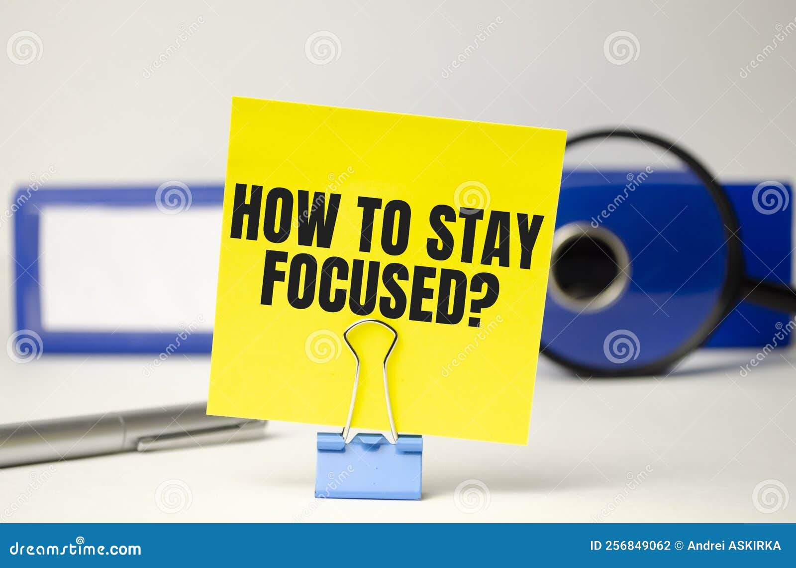Word How To Stay Focused on Yellow Sticker and Blue Folder Stock Photo ...