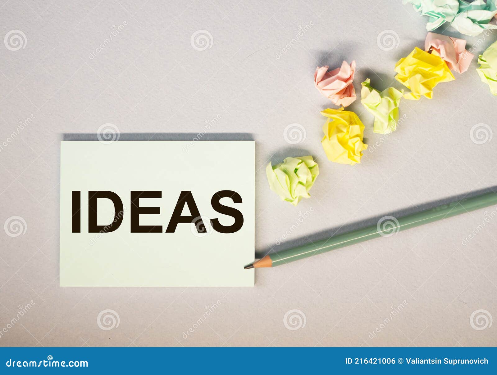 Word Ideas on Note with Crumpled Colorful Papers. Development of New ...