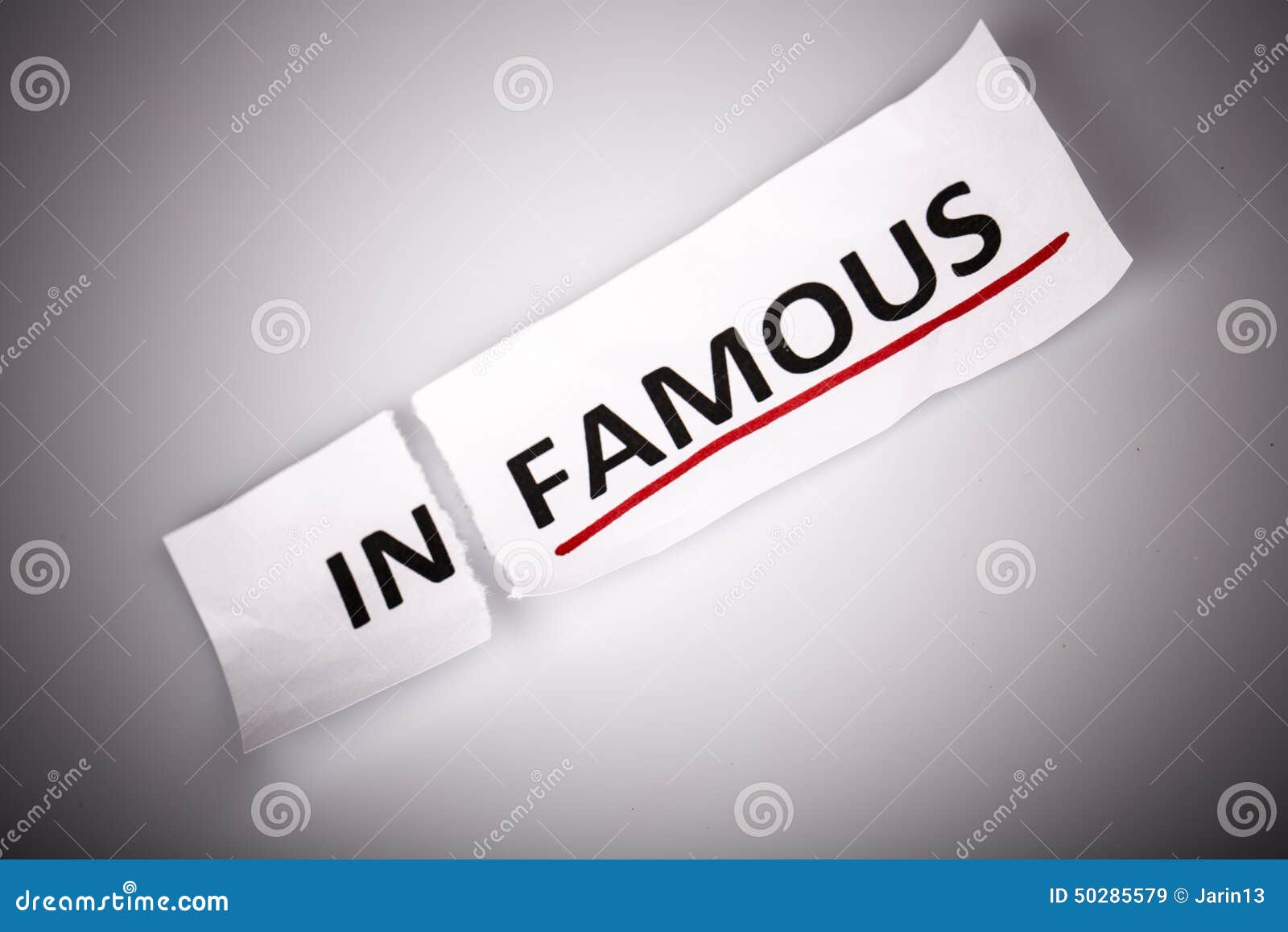 The Word Infamous Changed To Famous On Torn Paper Royalty-Free Stock ...