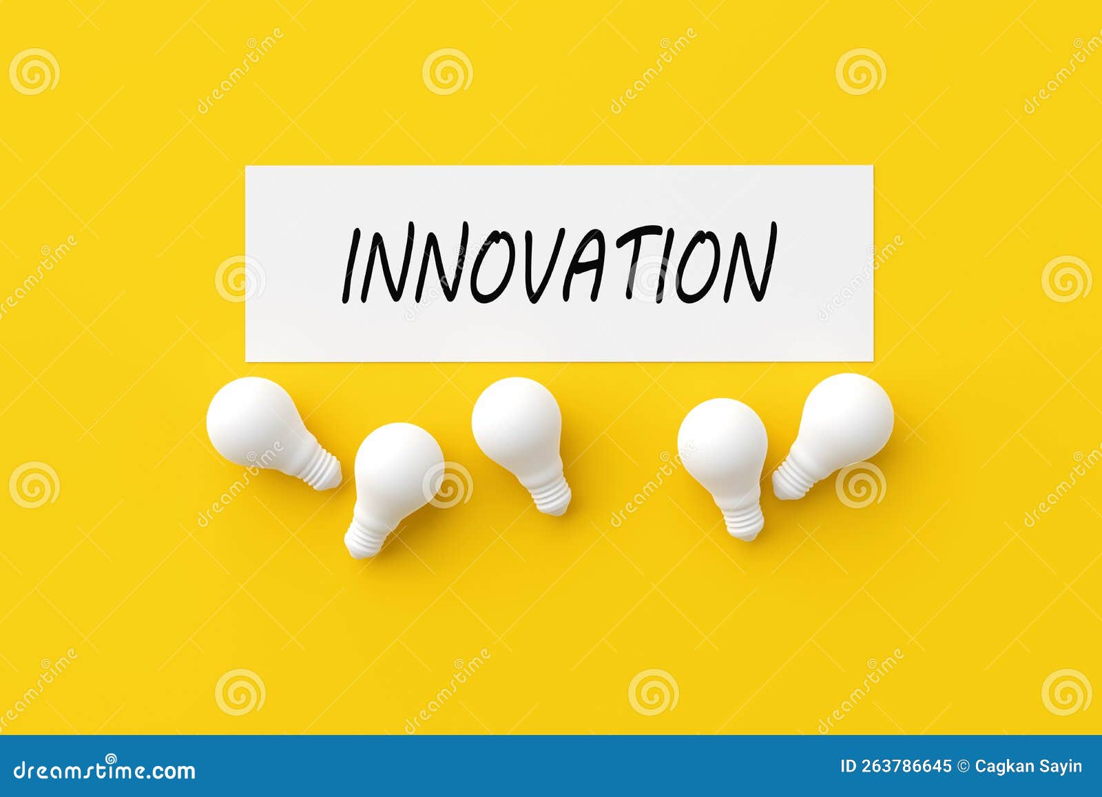 The Word Innovation on White Paper with Light Bulbs. Innovation and ...